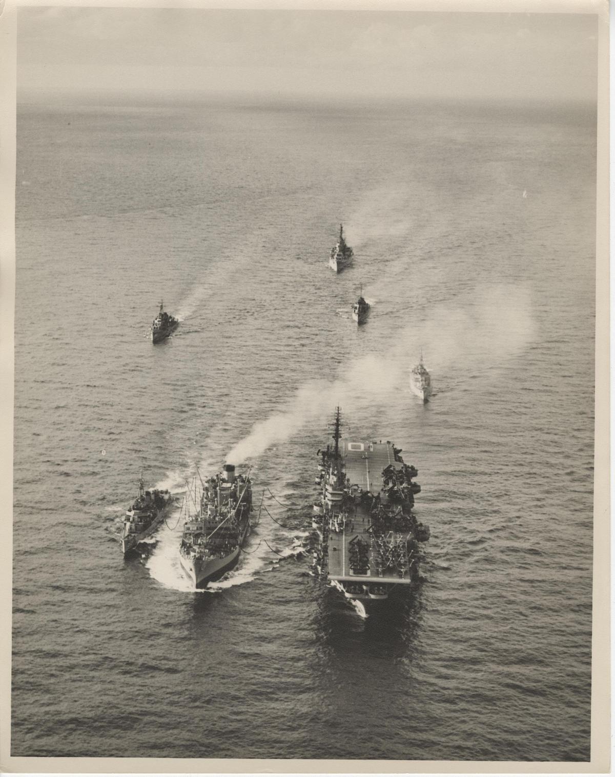 USS Yorktown (CVA-10) and USS Daly (DD-519) Being Refueled by a Supply ...